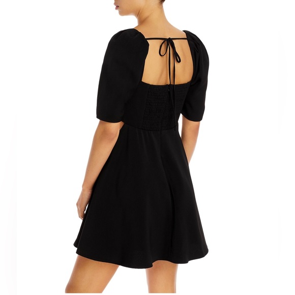 Lucy Paris | Dresses | Black Mini Dress With Small Side Cut Outs | Poshmark